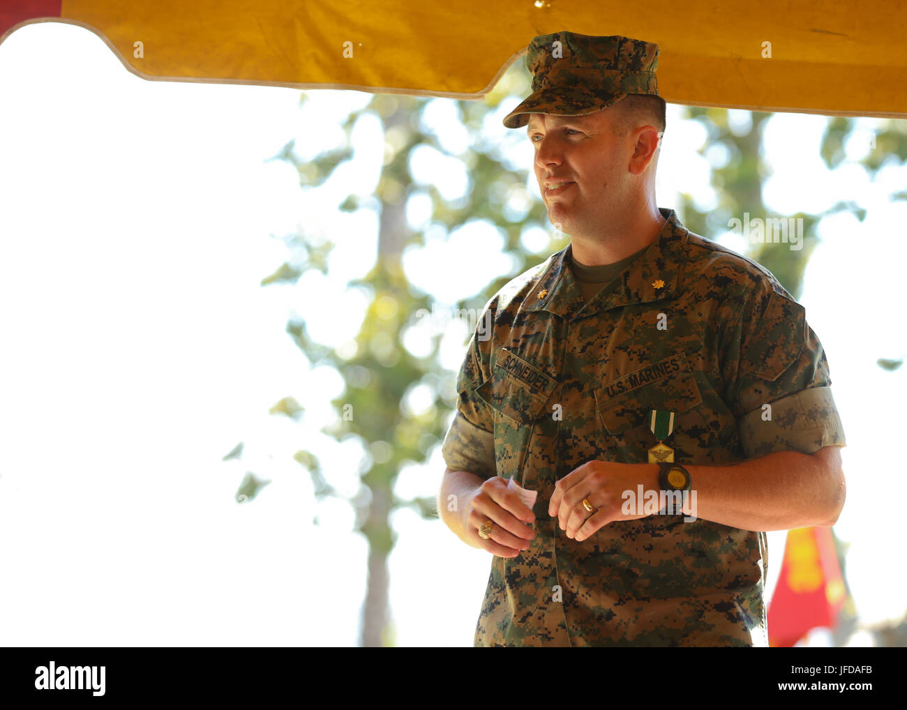 Maj. Jason Schneider, outgoing company commander, Headquarters and ...