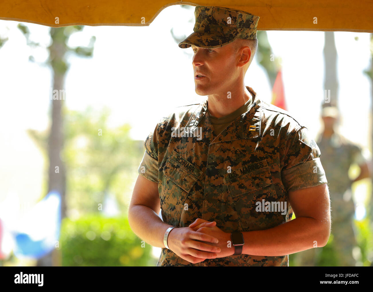 Capt. Jeremy Schnarr, ingoing company commander, Headquarters and ...
