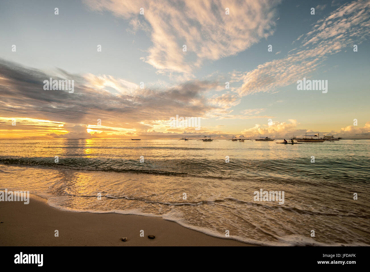 Tropical beach sunset at Philippines Stock Photo - Alamy