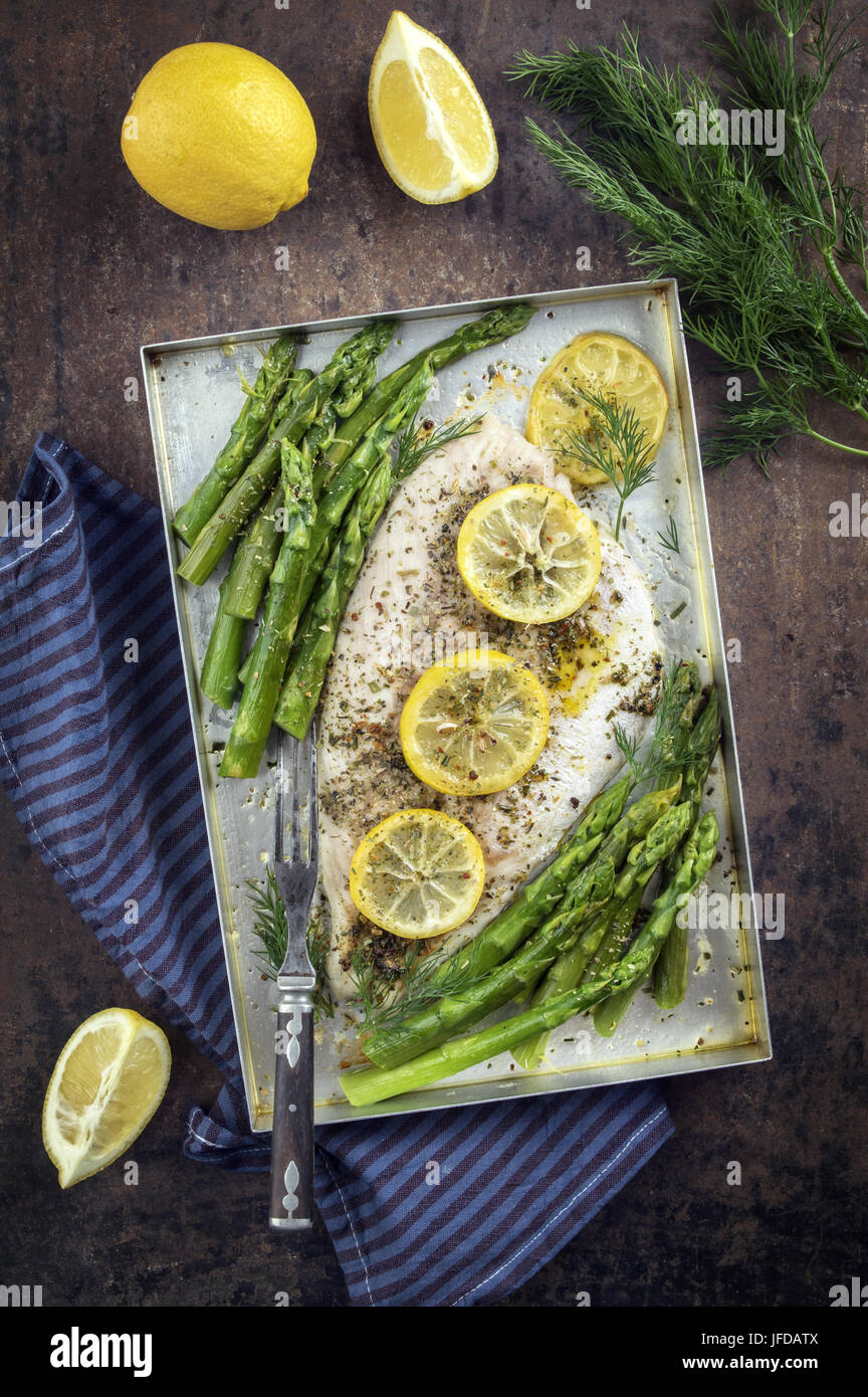 Coalfish Filet with Green Asparagus Stock Photo - Alamy