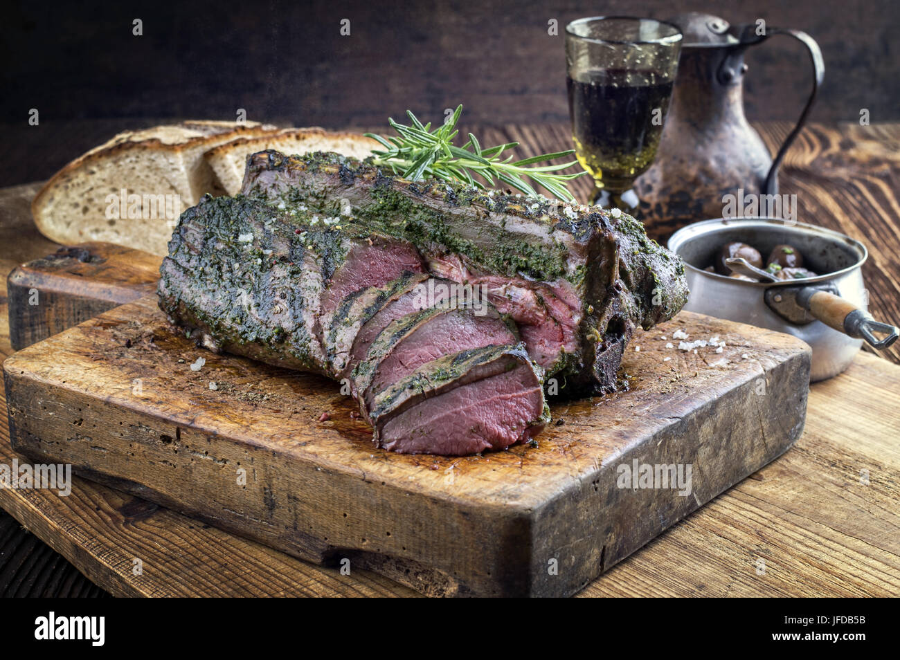 Barbecue Saddle of Venison on Cutting Board Stock Photo - Alamy