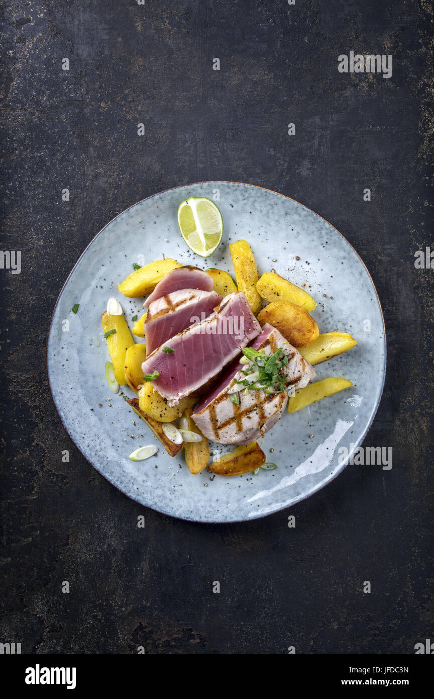 Tuna Steak with Fries Stock Photo - Alamy