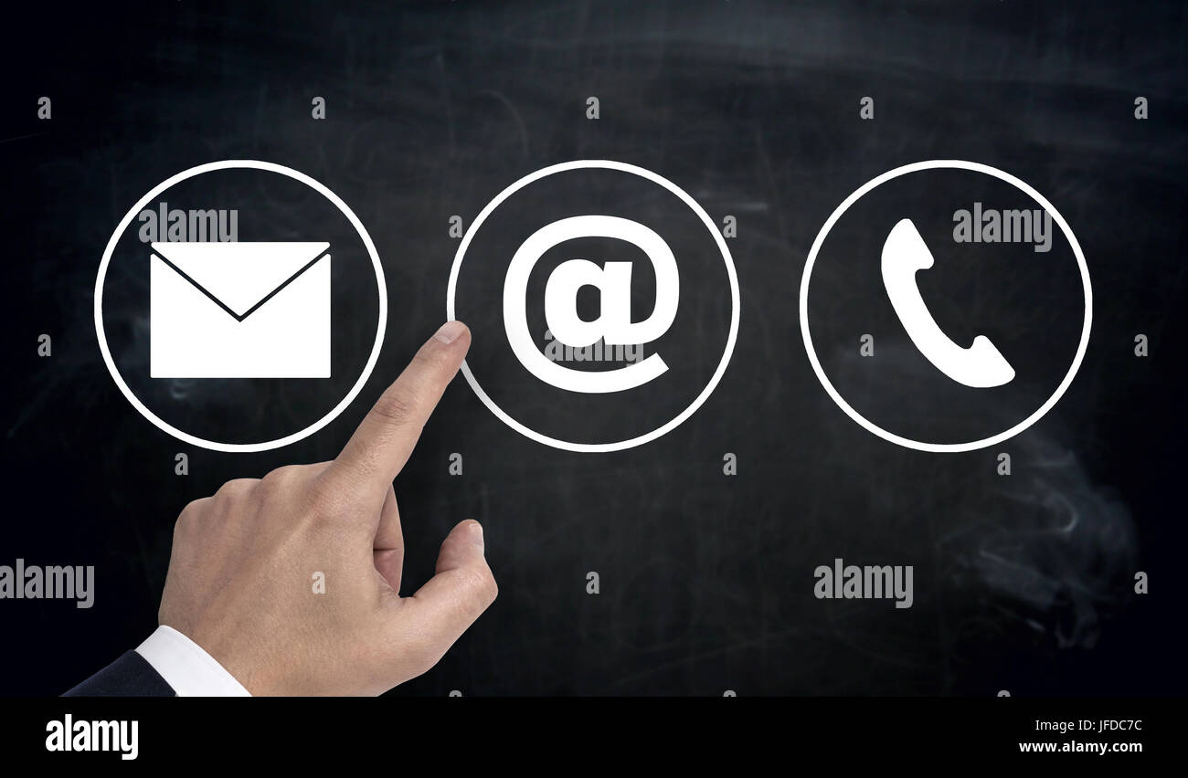Hand pointing at contact options icons e-mail letter telephone Stock ...