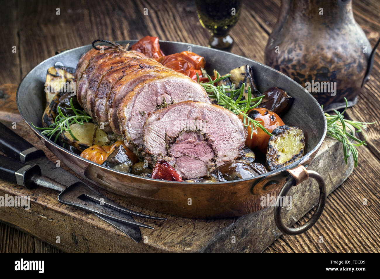 Rolled Lamb Roast with Barbecue Vegetable Stock Photo - Alamy