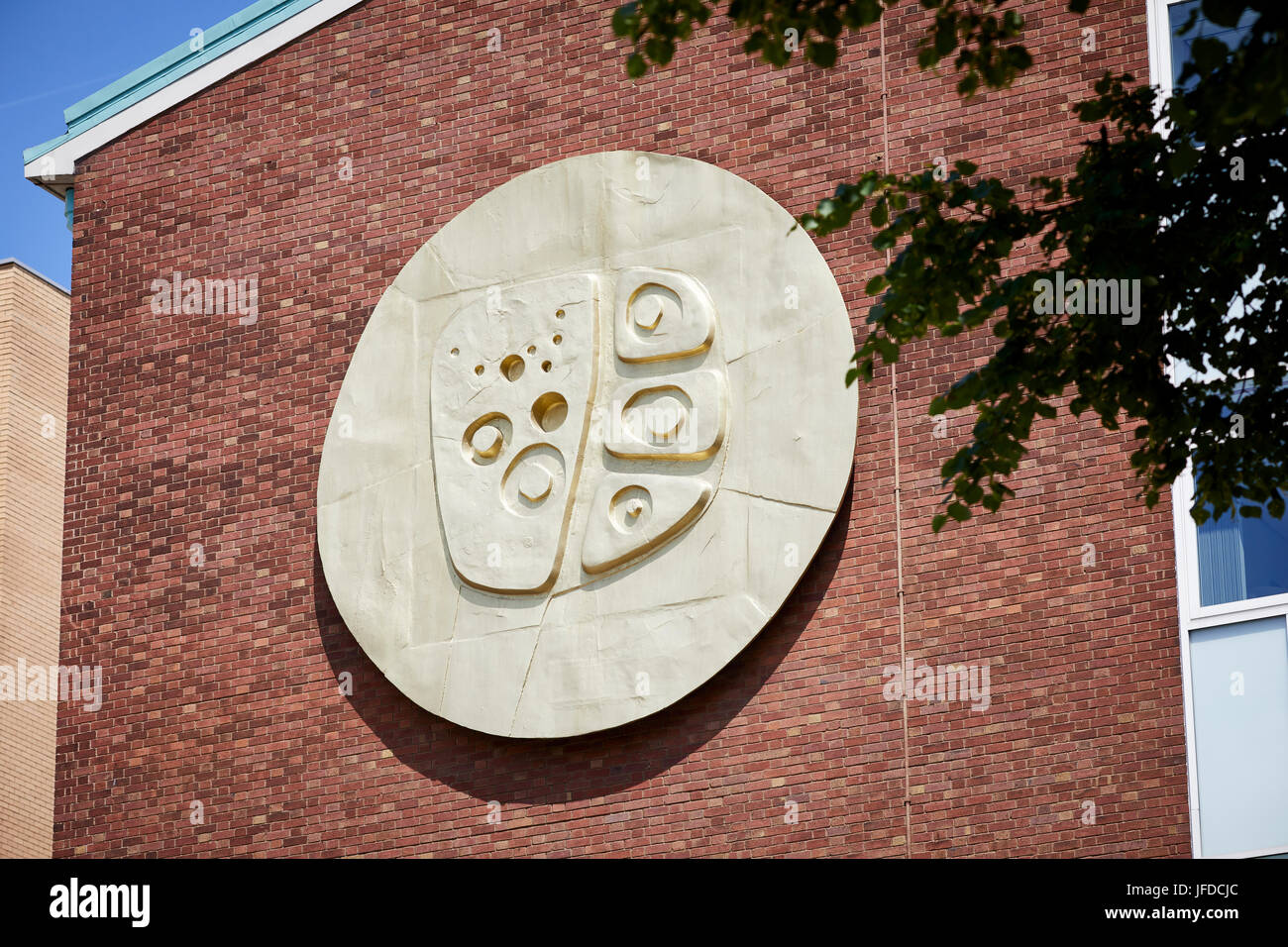 Modernist gold artwork badge sculpture on Williamson building at ...
