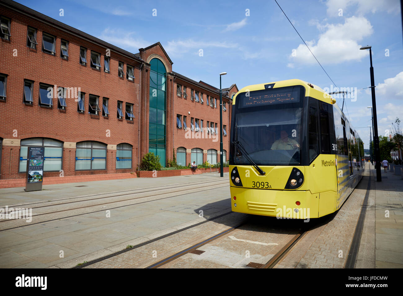 A yellow Metrolink tram at Union Street in Oldham Greater Manchester ...