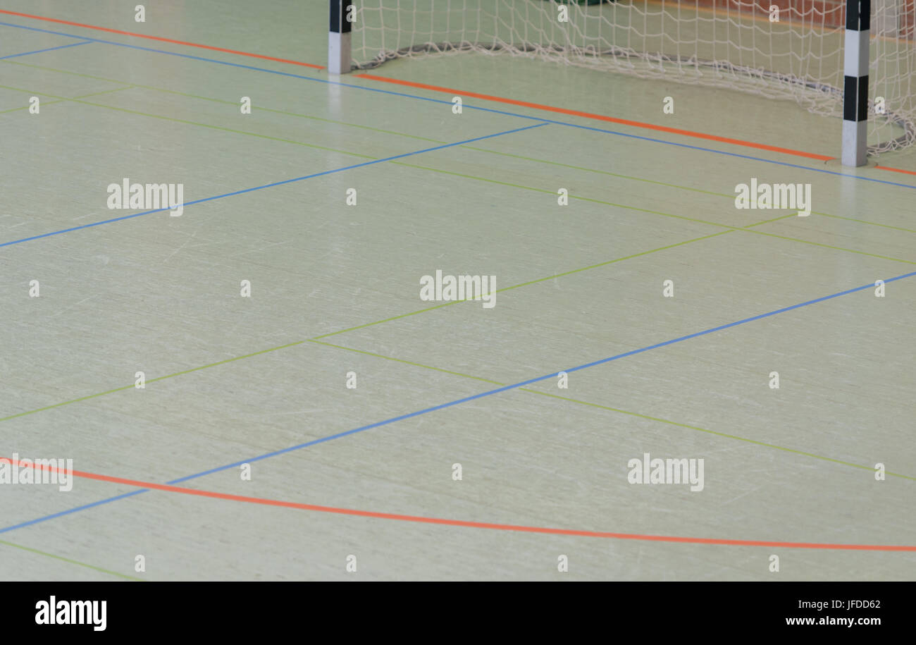 Handball Hall floor in a gym Stock Photo - Alamy