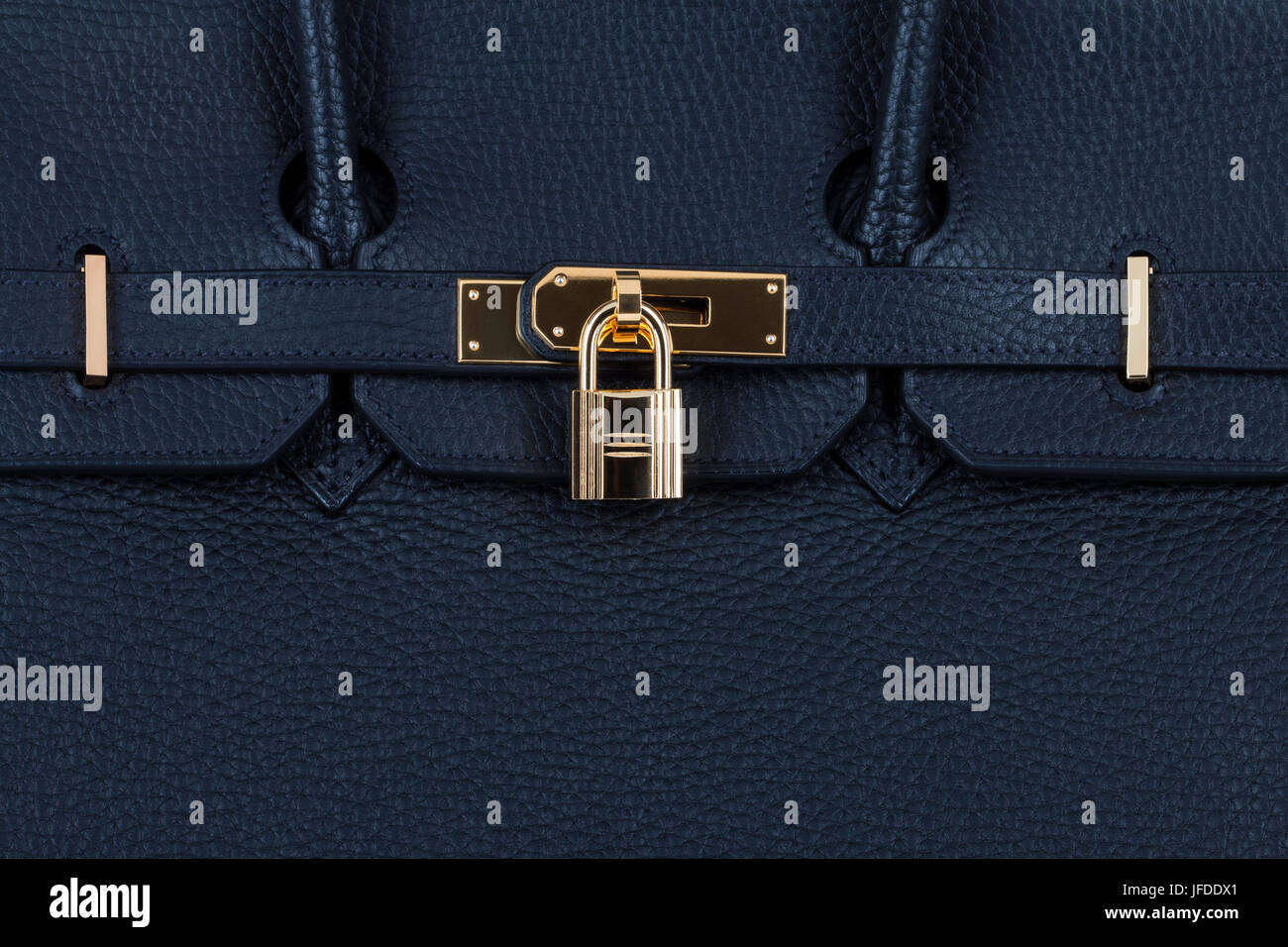 Closeup view of female blue leather handbag with golden clasp. Fashion ...