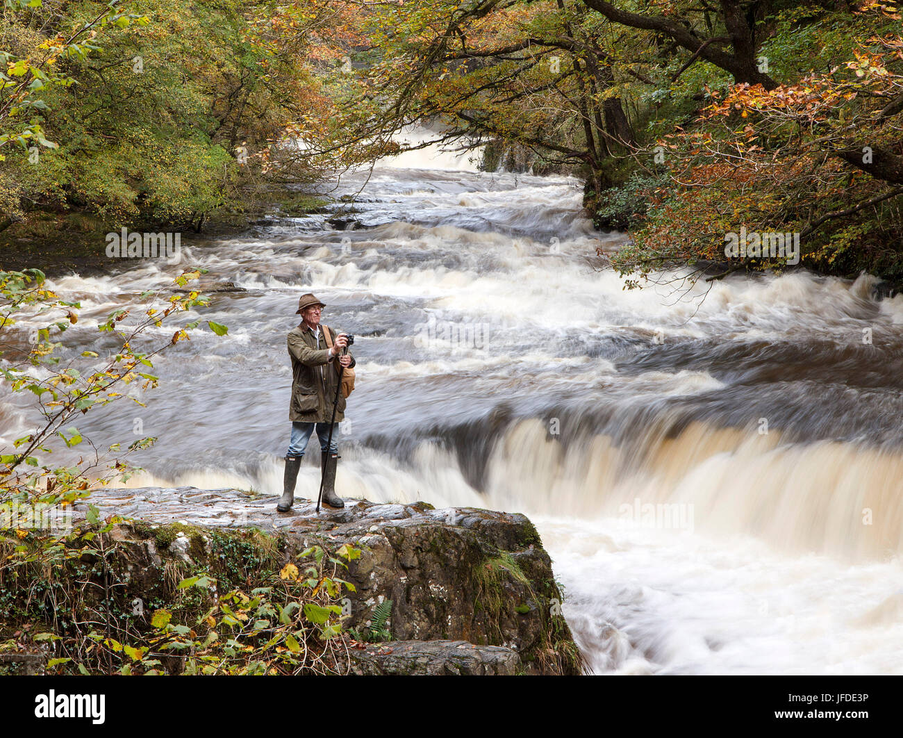 Photographer by a River Stock Photo - Alamy