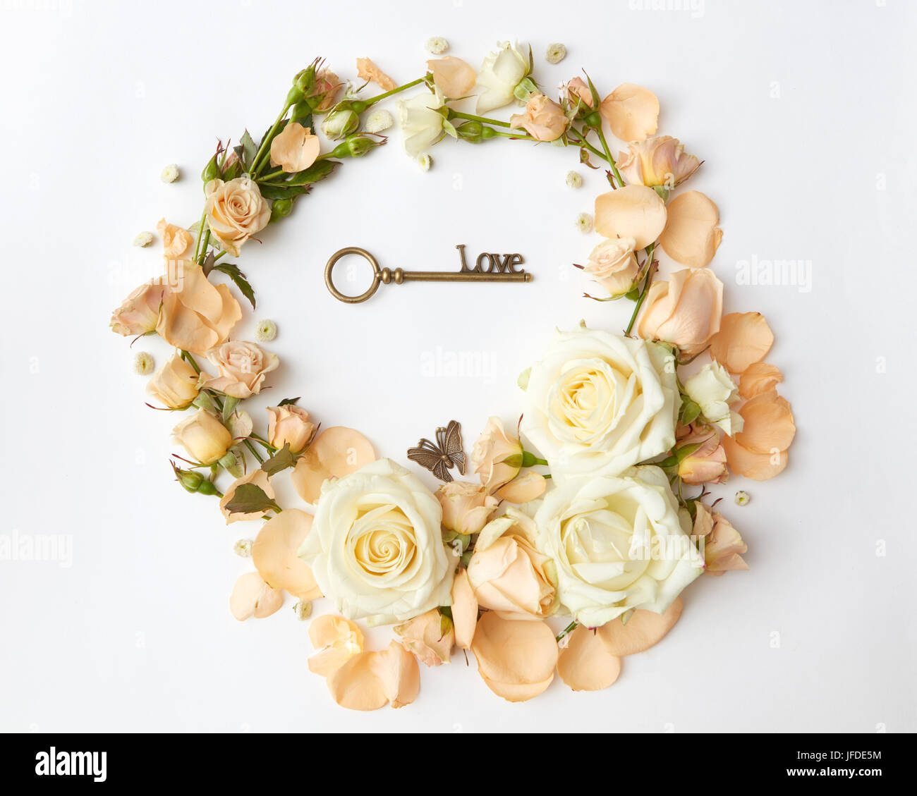 Red roses with key Stock Photo - Alamy