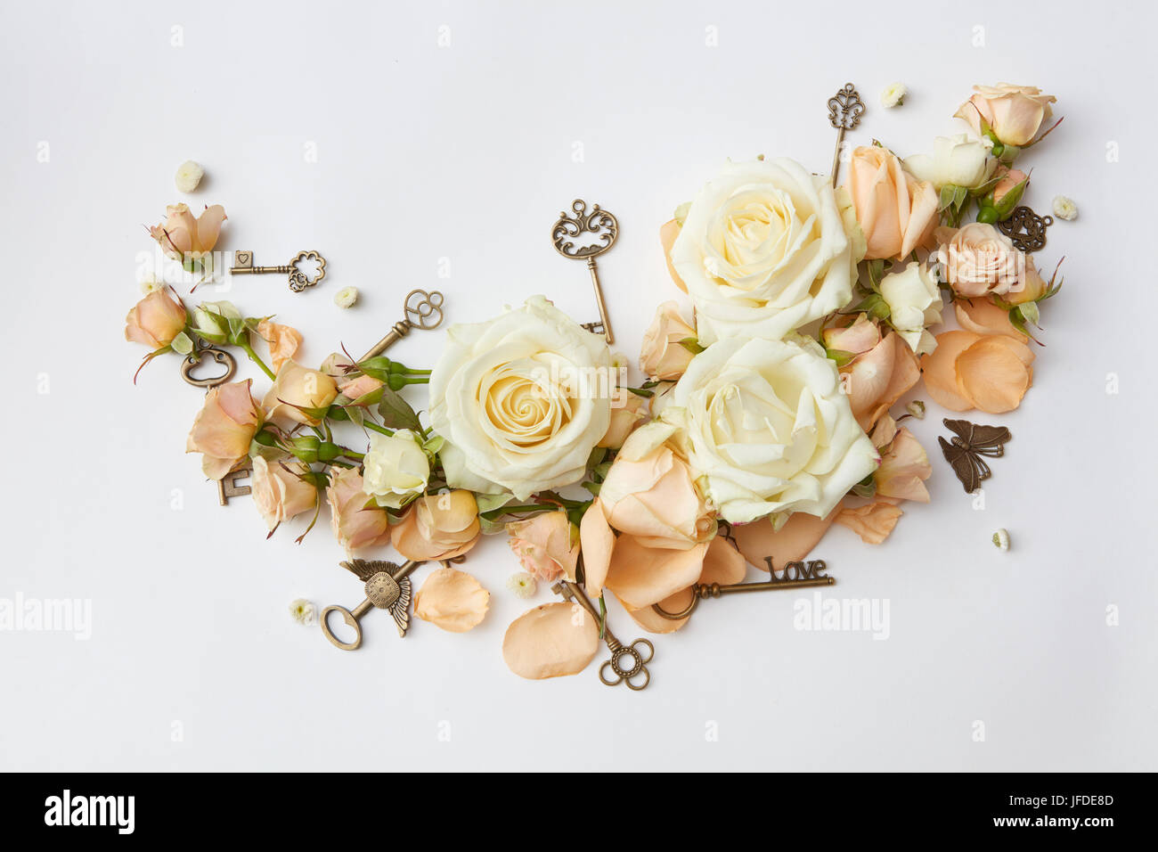 Red roses with key Stock Photo - Alamy