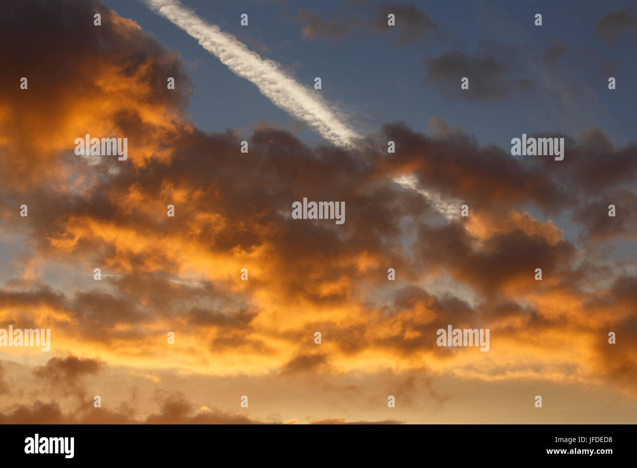 Glowing Sunset in the Clouds Stock Photo - Alamy
