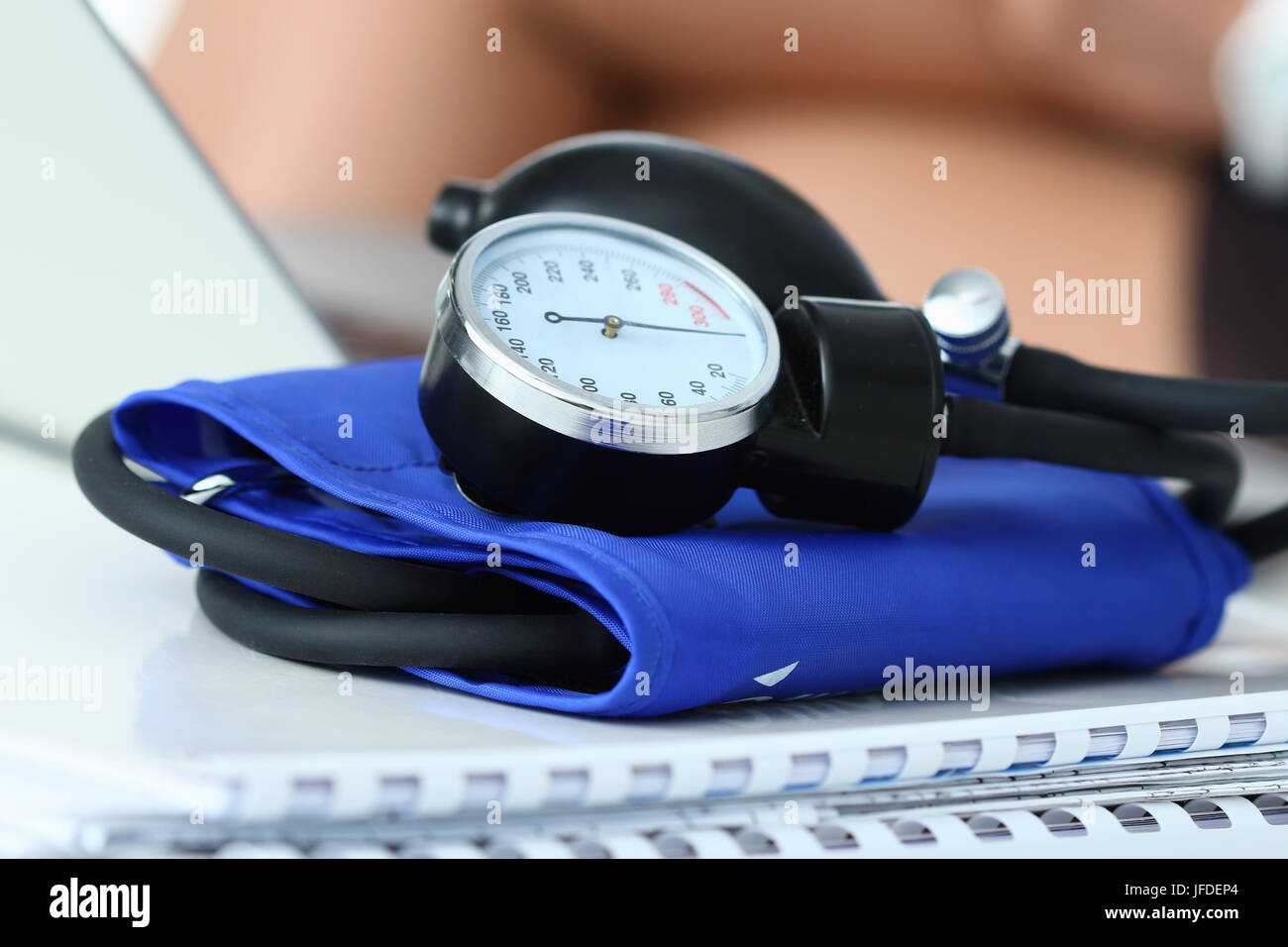Medicine doctor working place. Close up view of manometer laying on ...