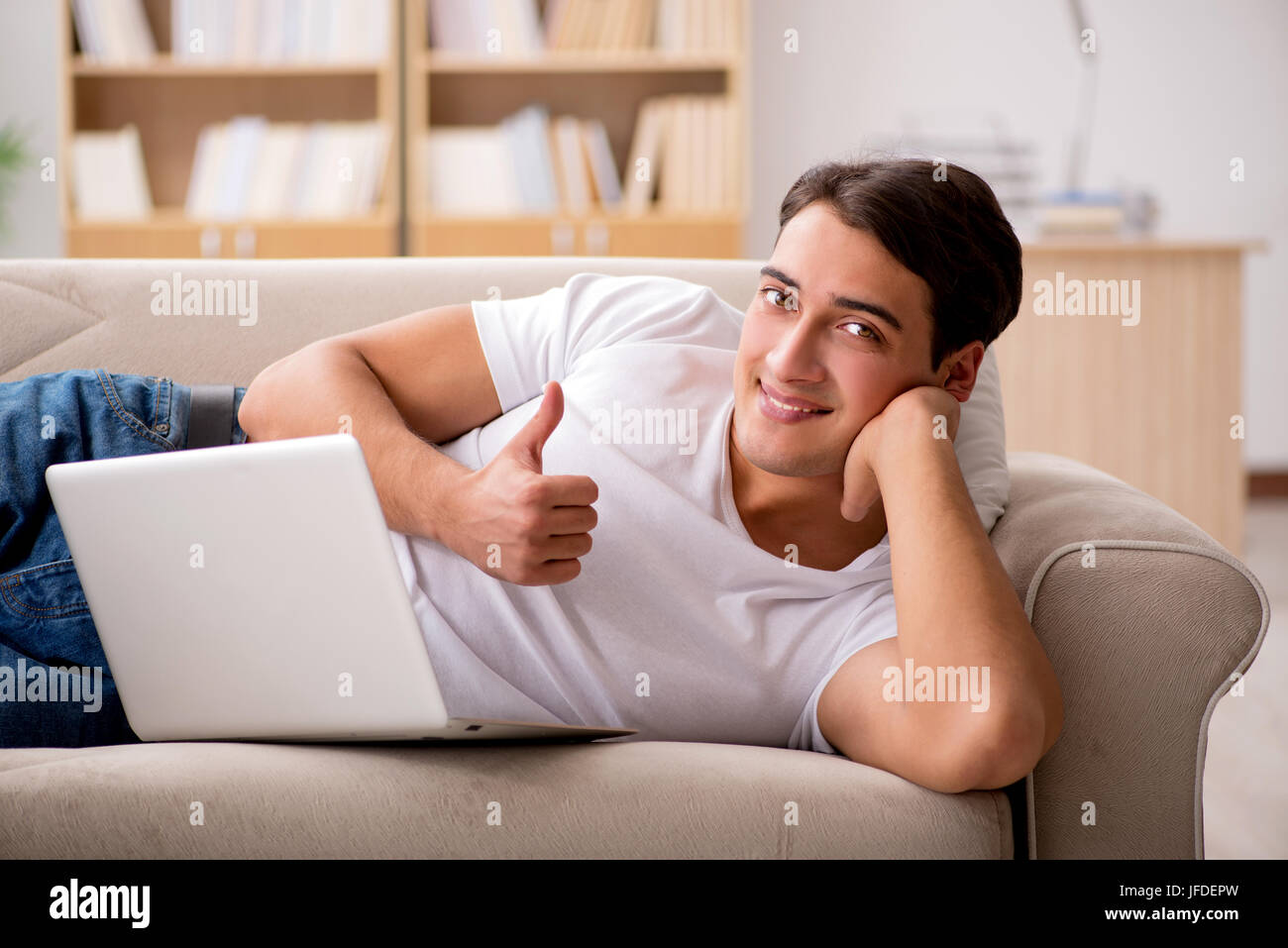 Young man working in the office Stock Photo - Alamy