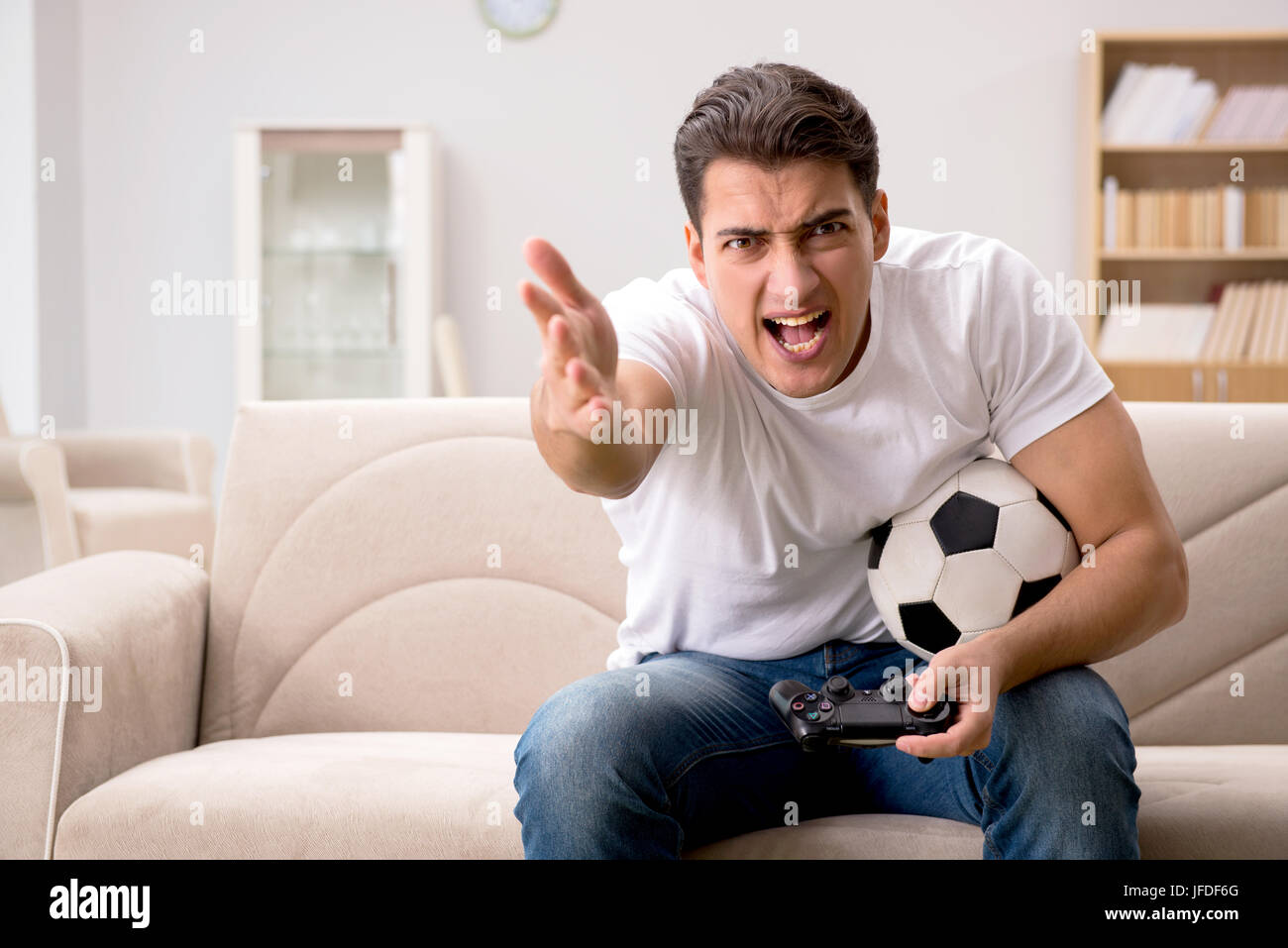 Man addicted to computer games Stock Photo - Alamy