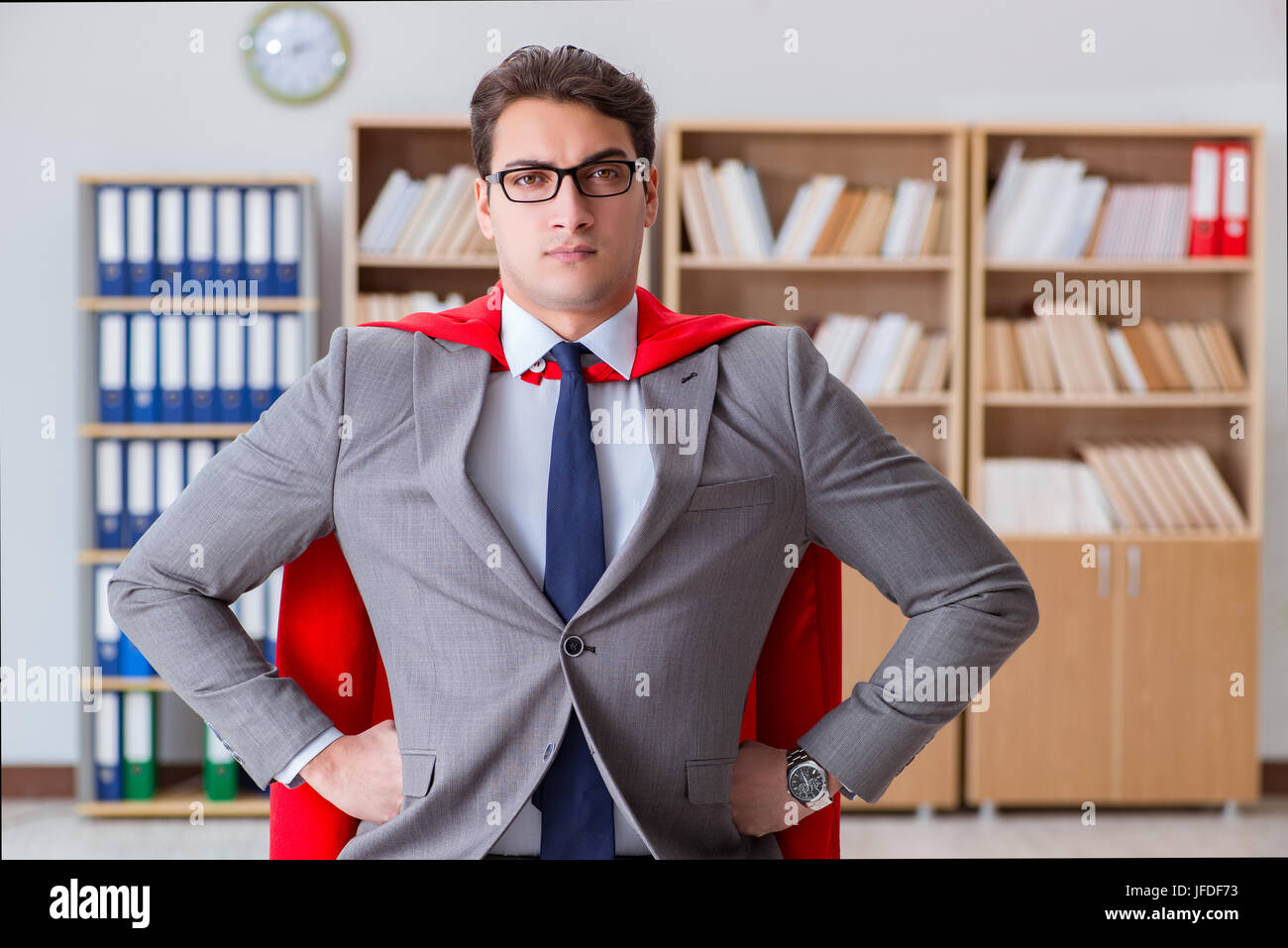Superhero businessman working in the office Stock Photo - Alamy