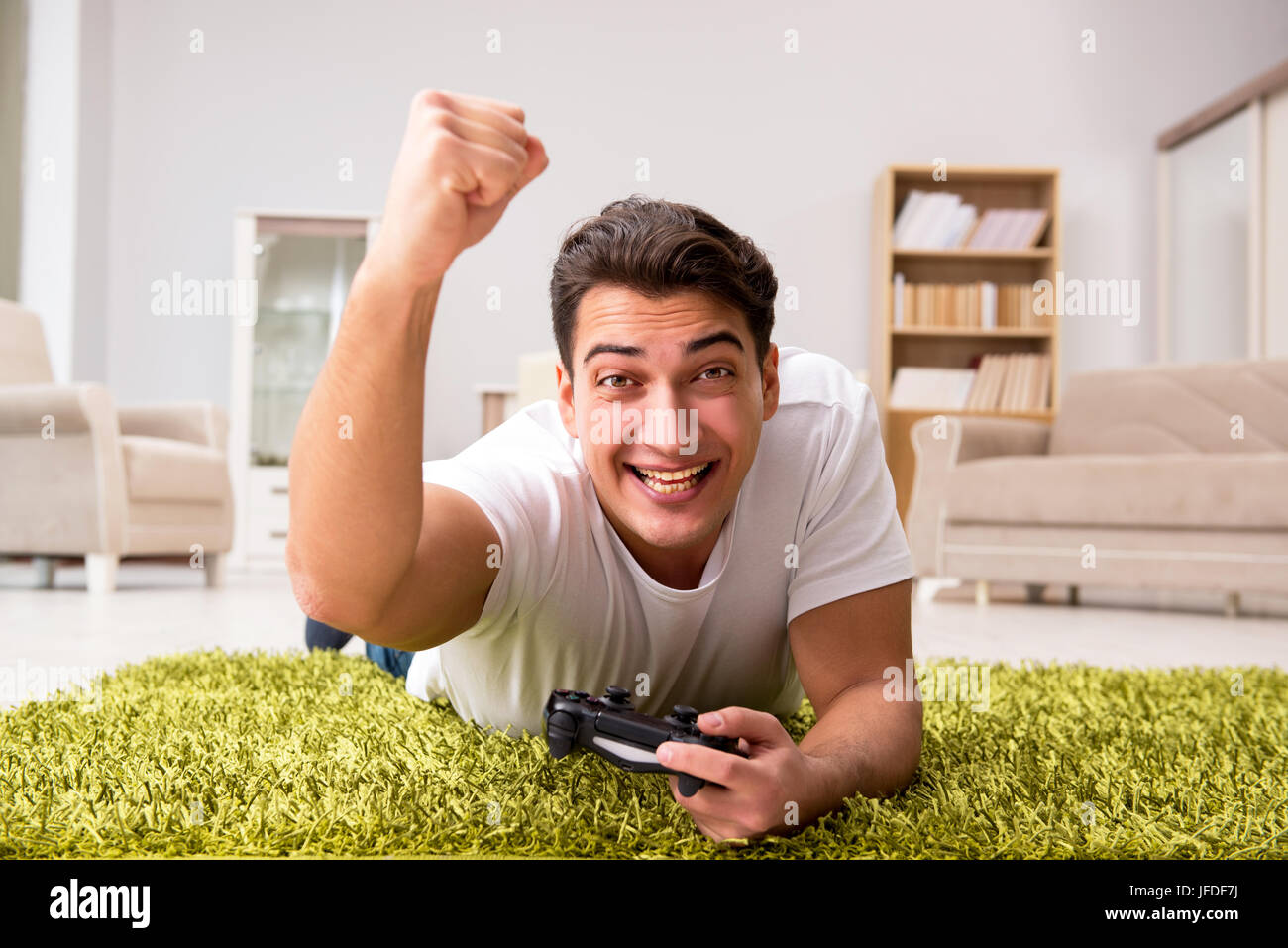 Man addicted to computer games Stock Photo - Alamy