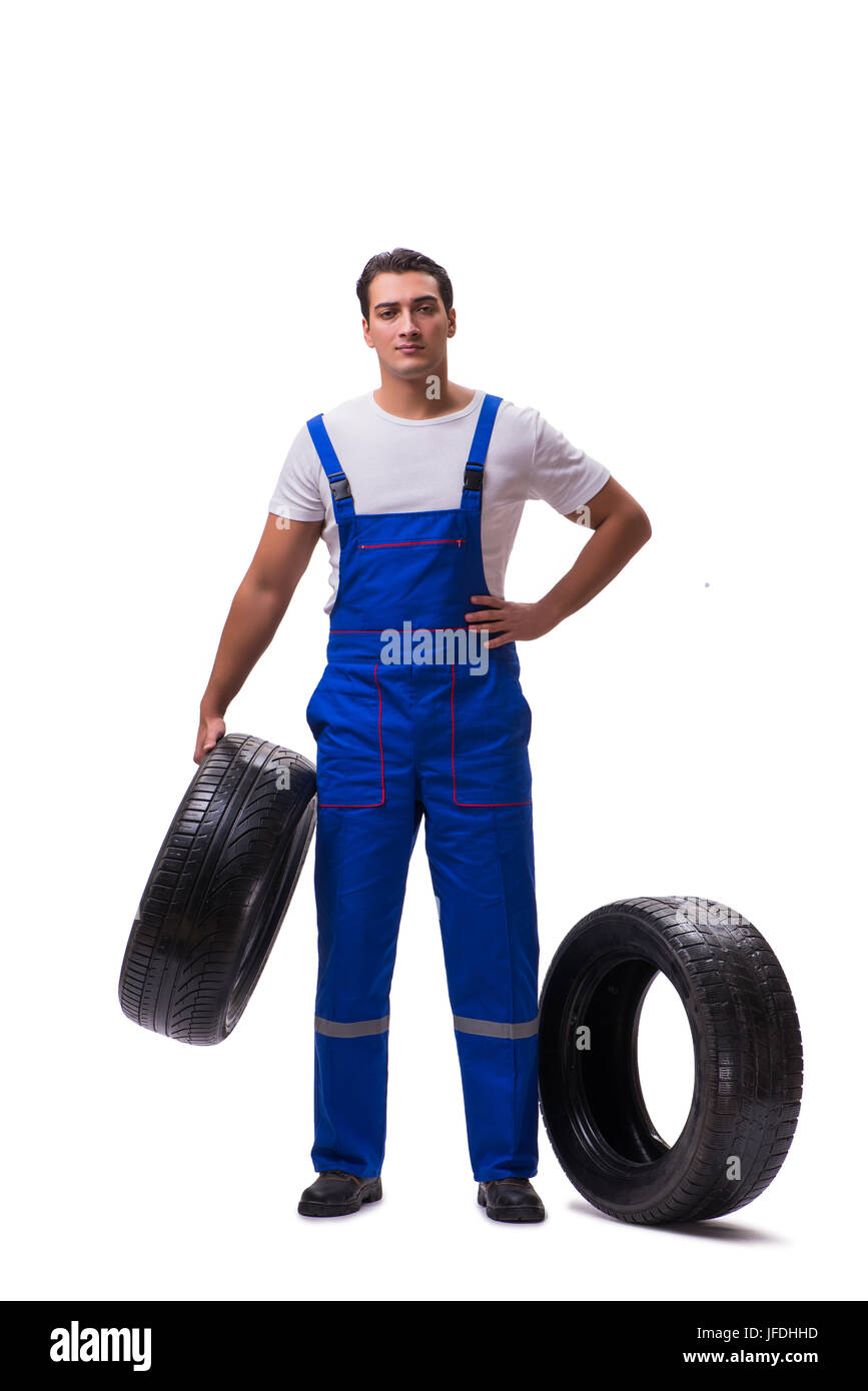 Handsome tyre repairman isolated on white Stock Photo - Alamy