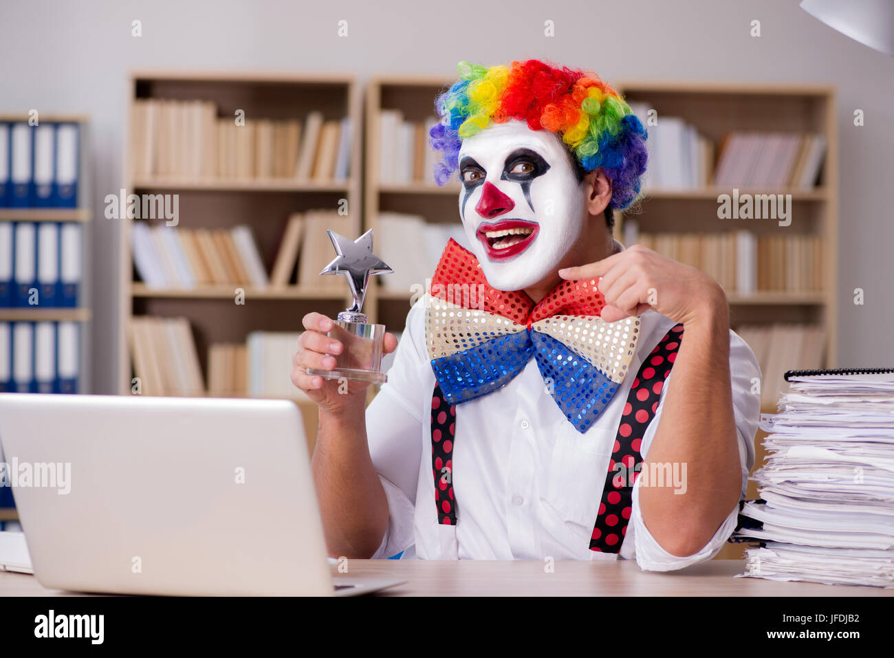 Clown businessman working in the office Stock Photo - Alamy
