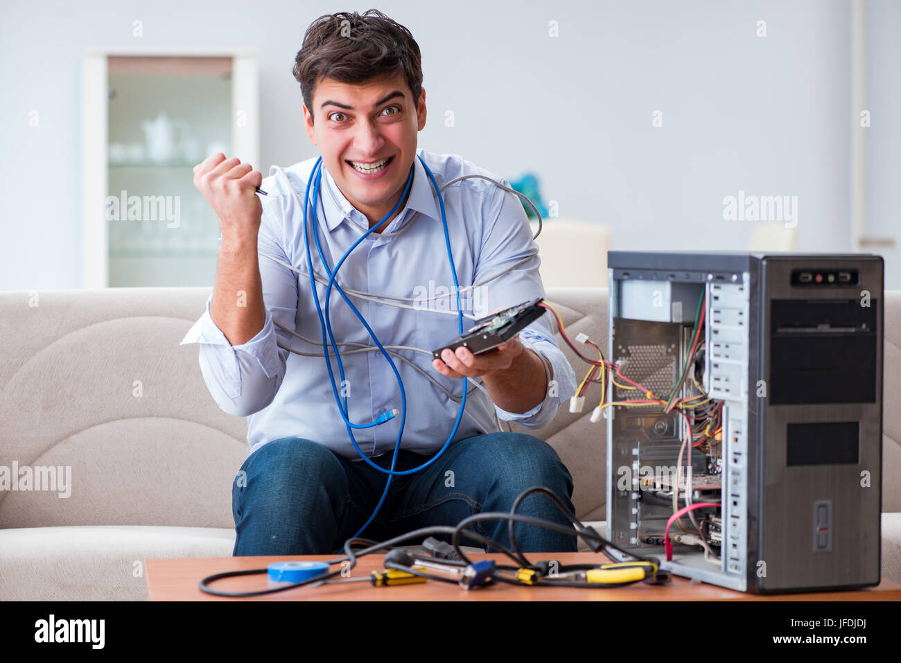 Frustrated man with broken pc computer Stock Photo - Alamy