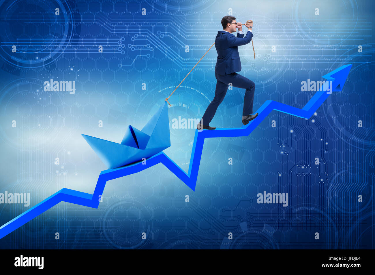 Businessman pulling boat over line chart Stock Photo - Alamy
