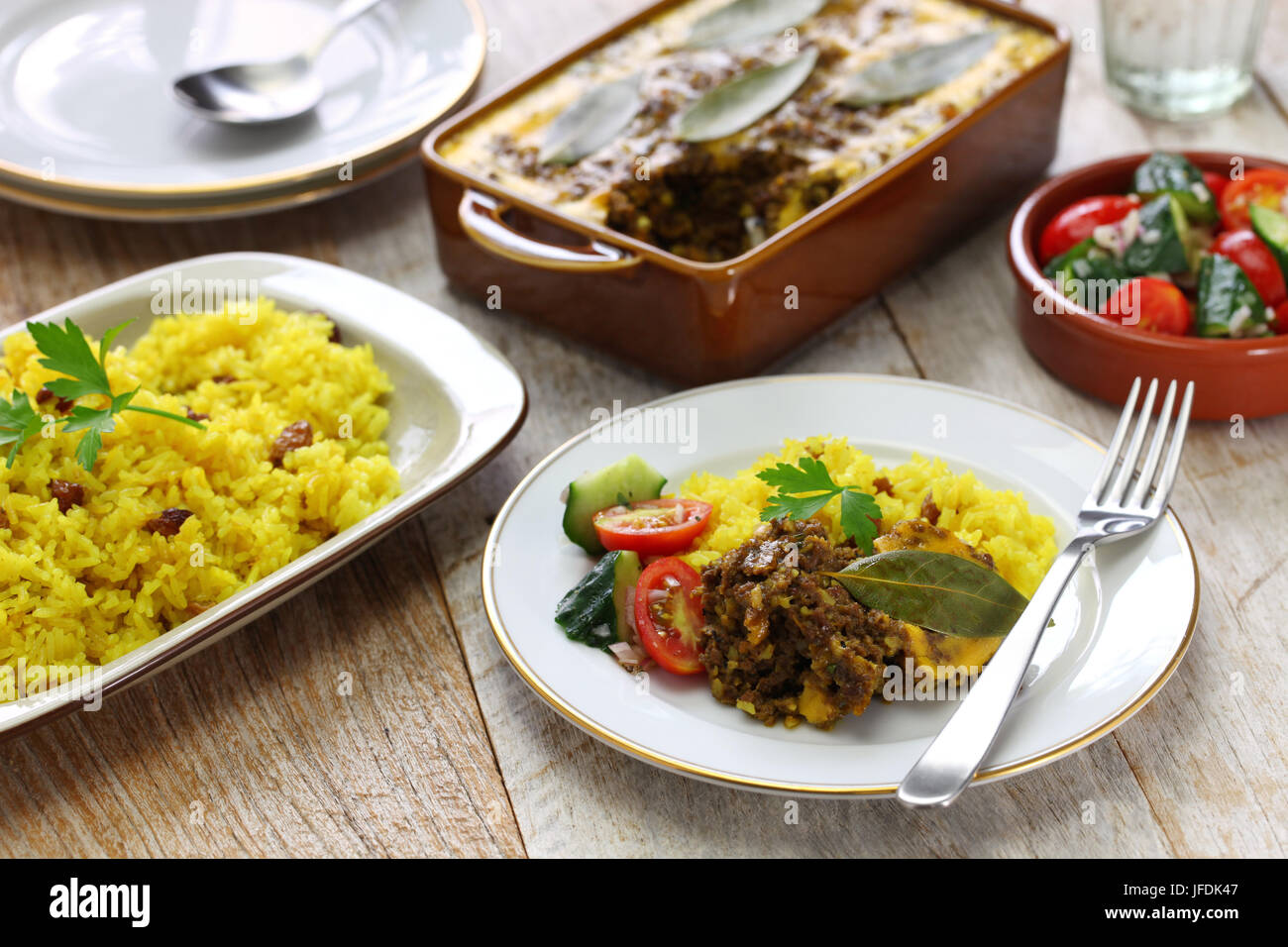 bobotie is a curry flavored meatloaf with baked egg on top Stock Photo ...