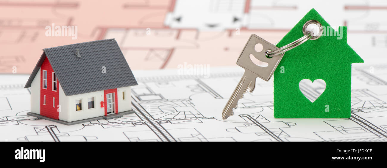 house key and model house on construction plan Stock Photo - Alamy