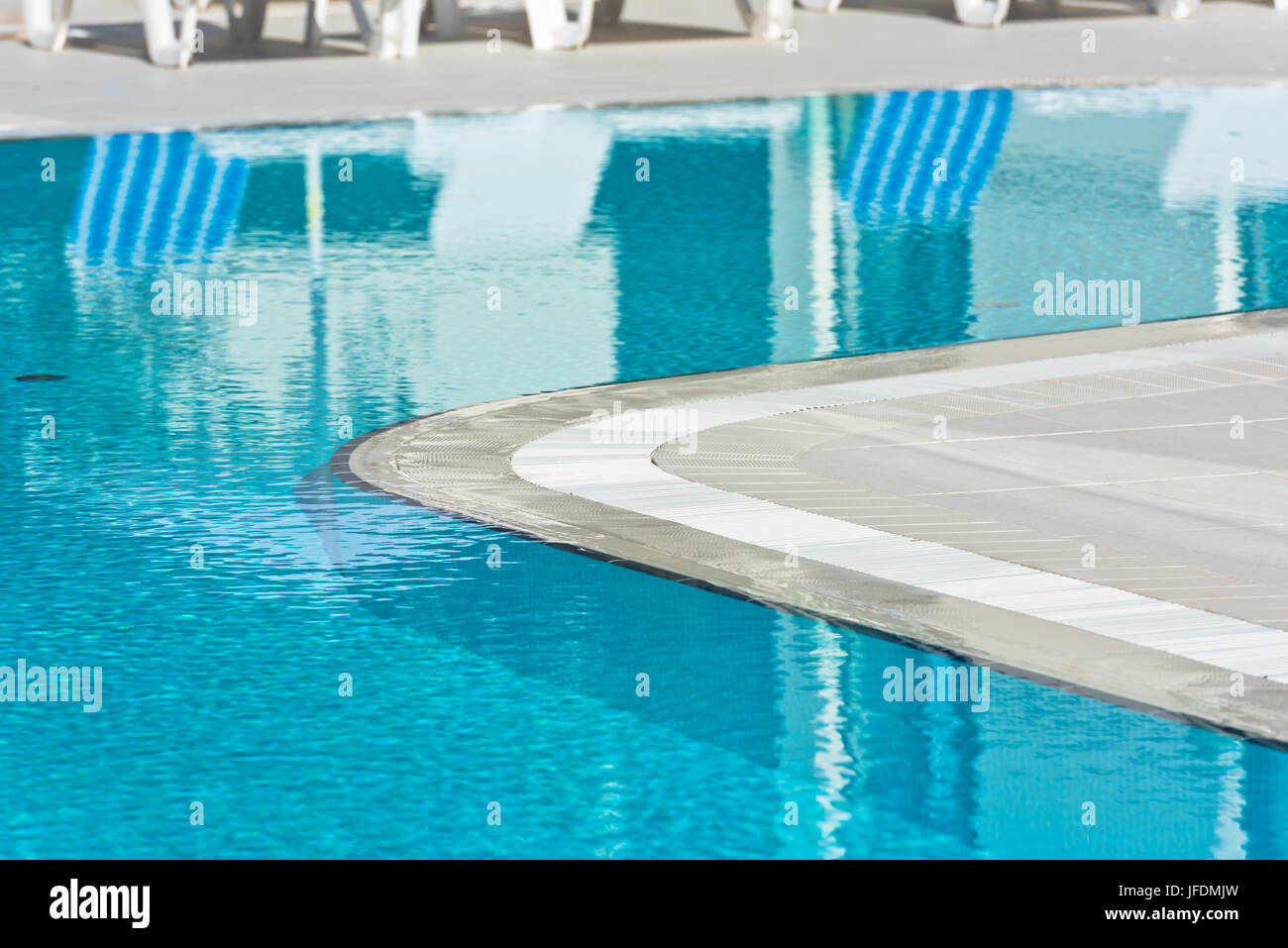 Clear blue bright water in the swimming pool Stock Photo - Alamy