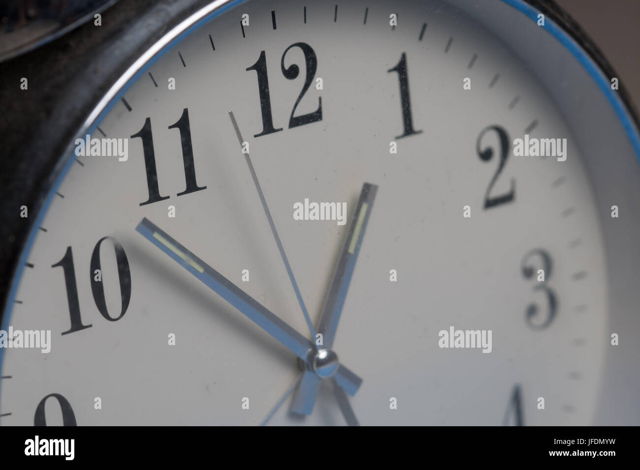 Closeup of hands on clock face. Time concept Stock Photo - Alamy