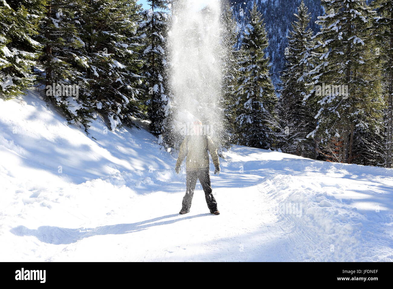 man have fun with snow dust Stock Photo - Alamy