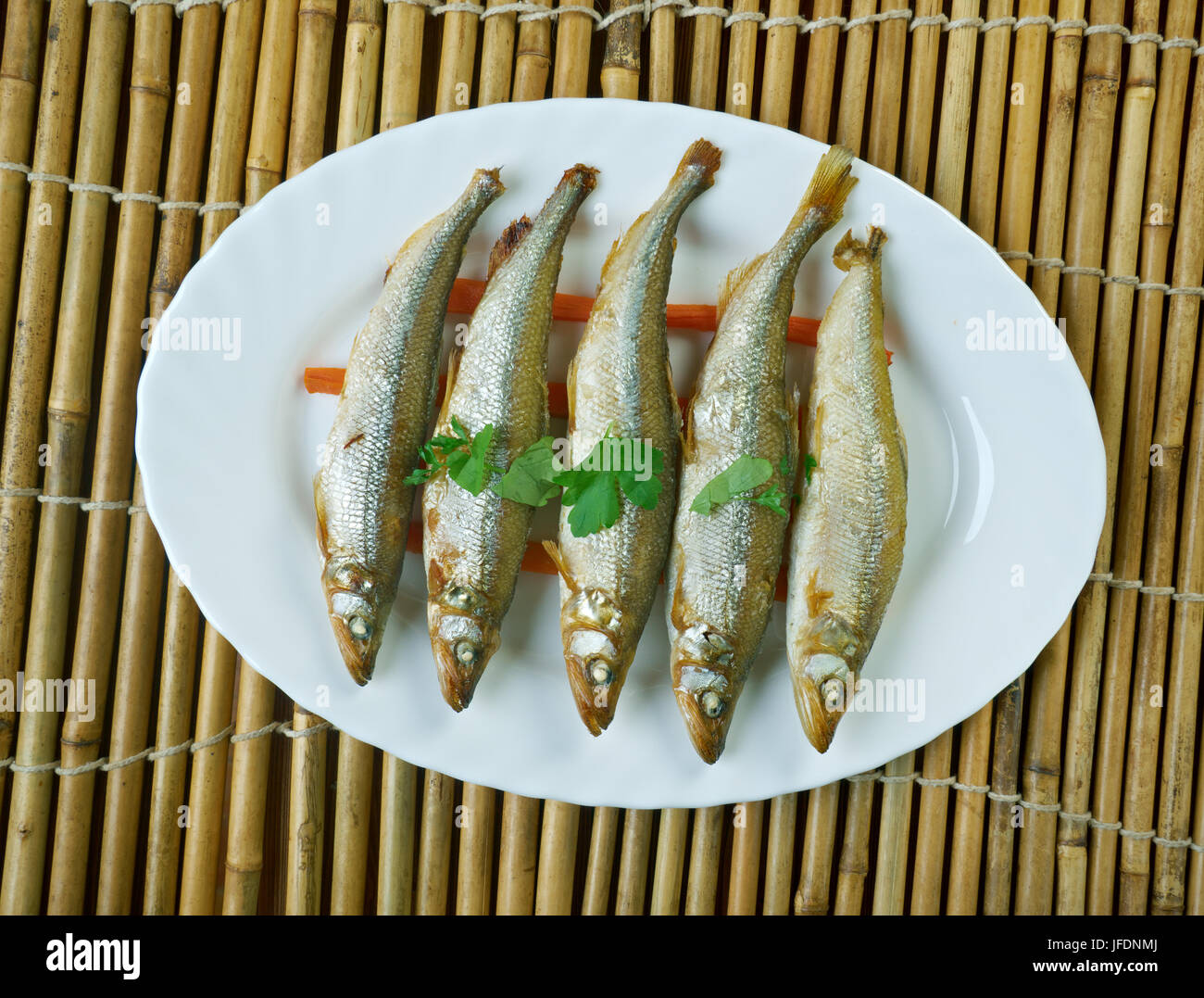 Roasted smelt fish hi-res stock photography and images - Alamy