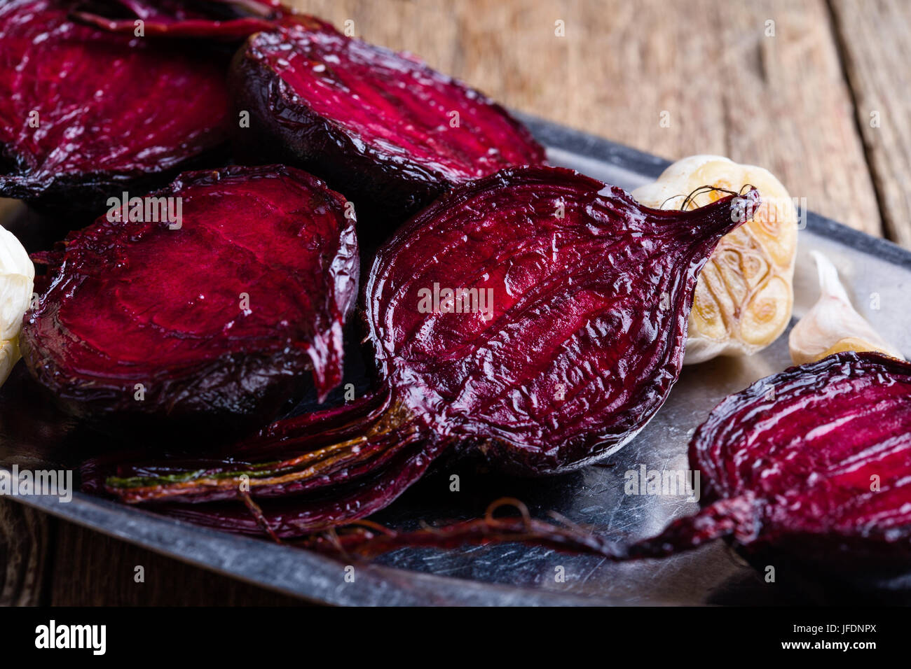 Sliced baked beetroot on rustic outdoor party table, diet and healthy ...