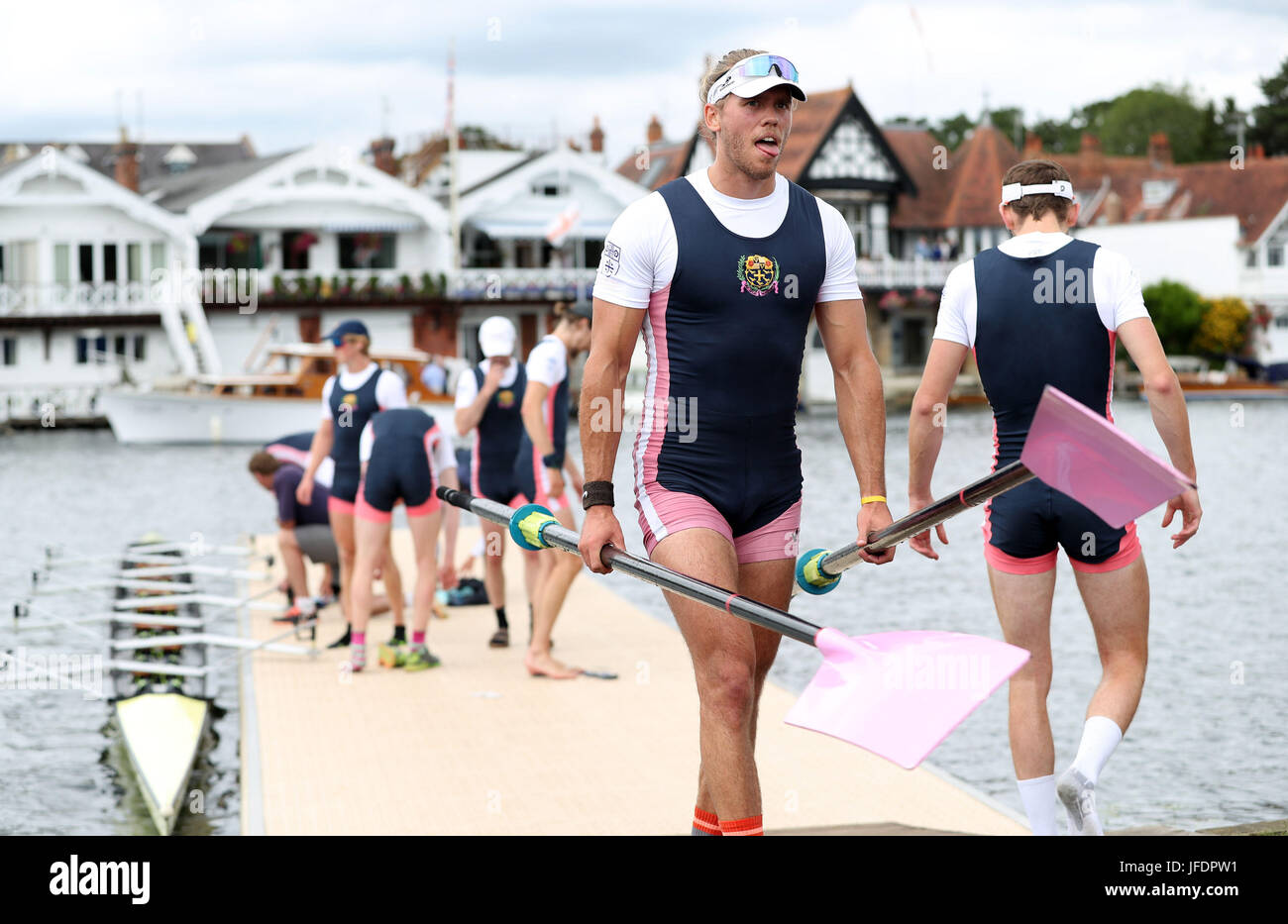 Members of the Elizabethan Boat Club make their way back to the boat ...