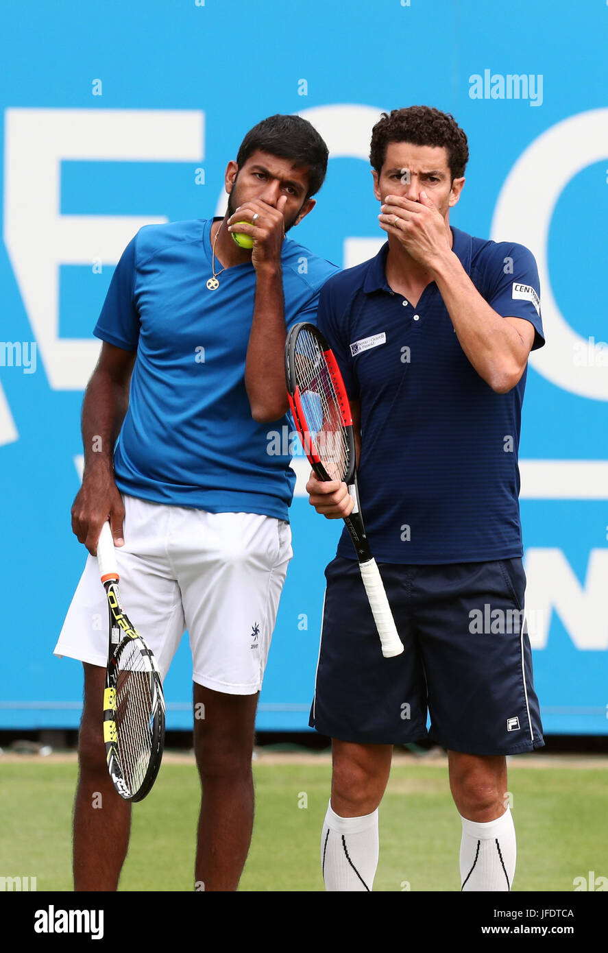 India's Rohan Bopanna (left) and Brazil's Andre Sa during the men's ...