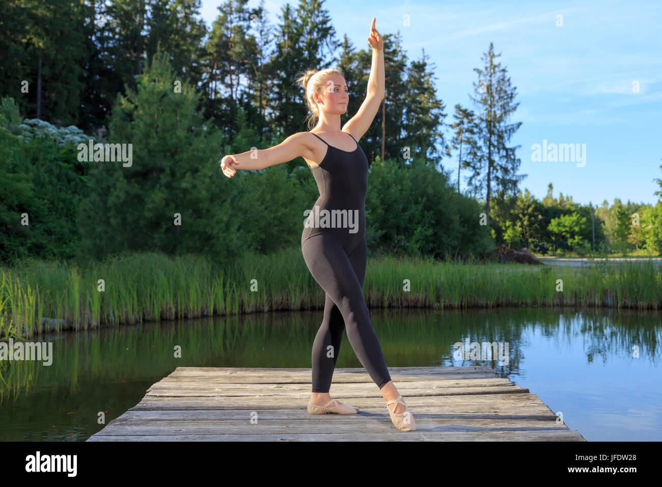 A pretty dancer dancing on a pear Stock Photo - Alamy