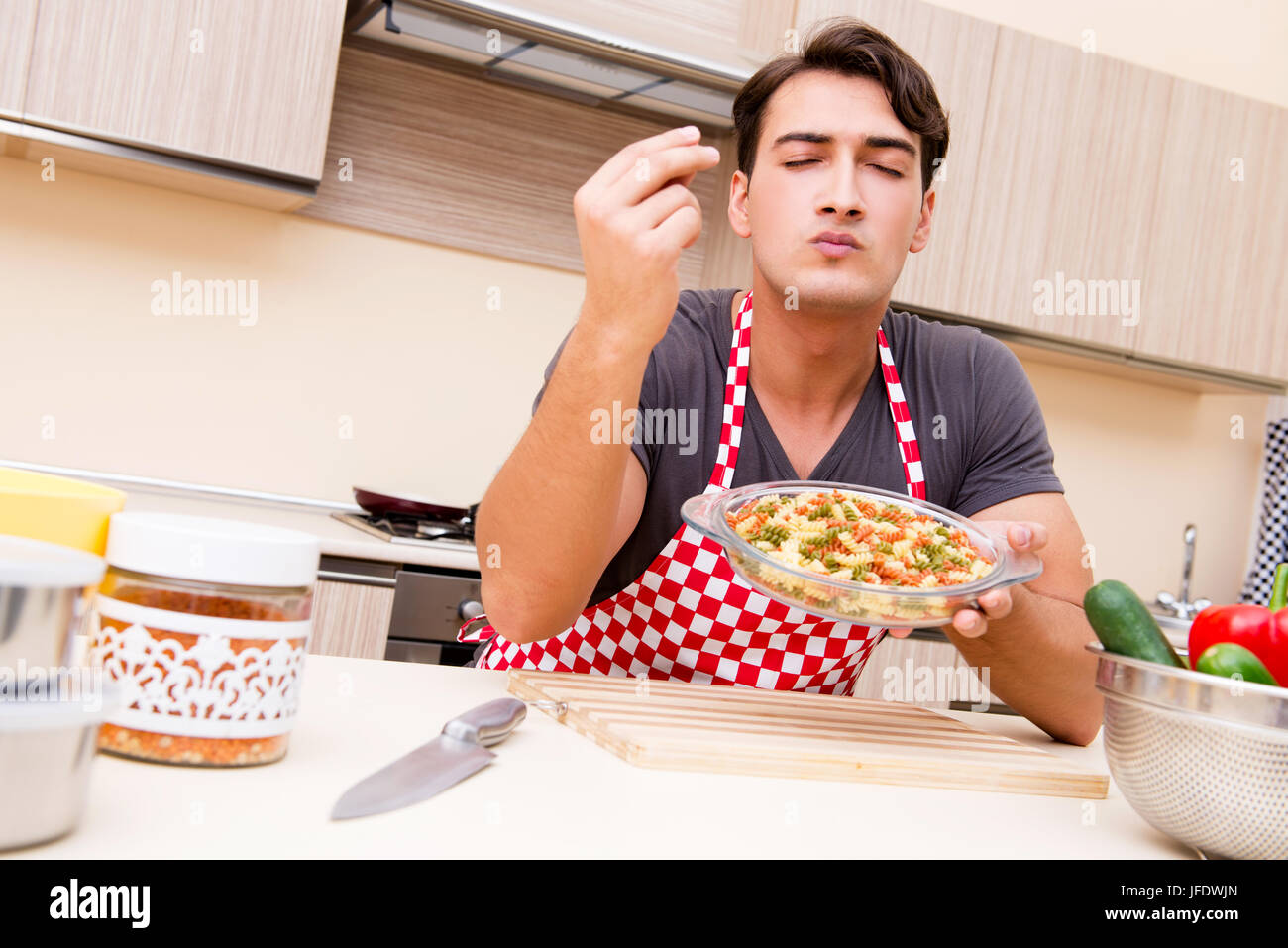 Man male cook preparing food in kitchen Stock Photo - Alamy