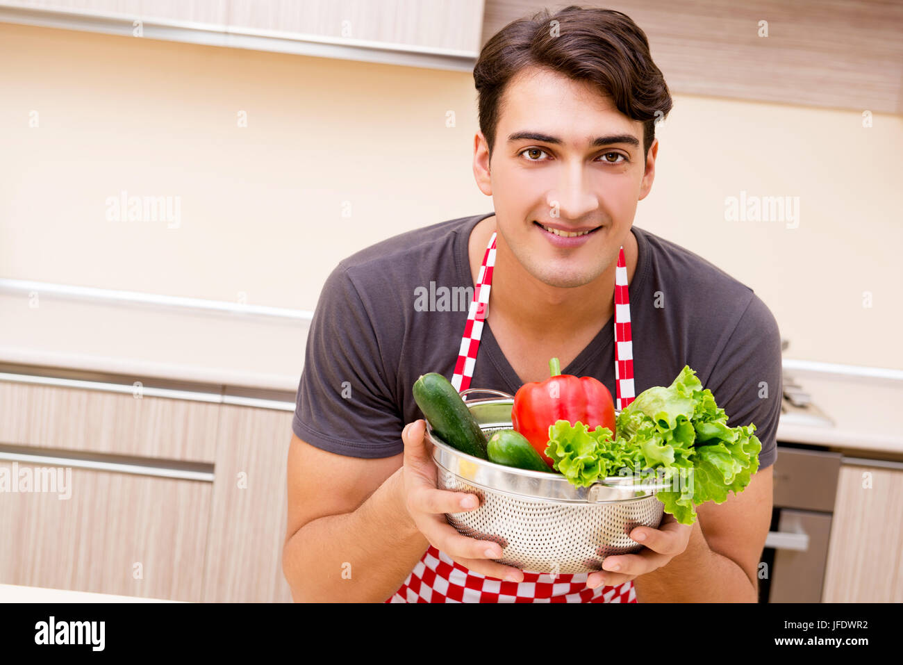 Man male cook preparing food in kitchen Stock Photo - Alamy