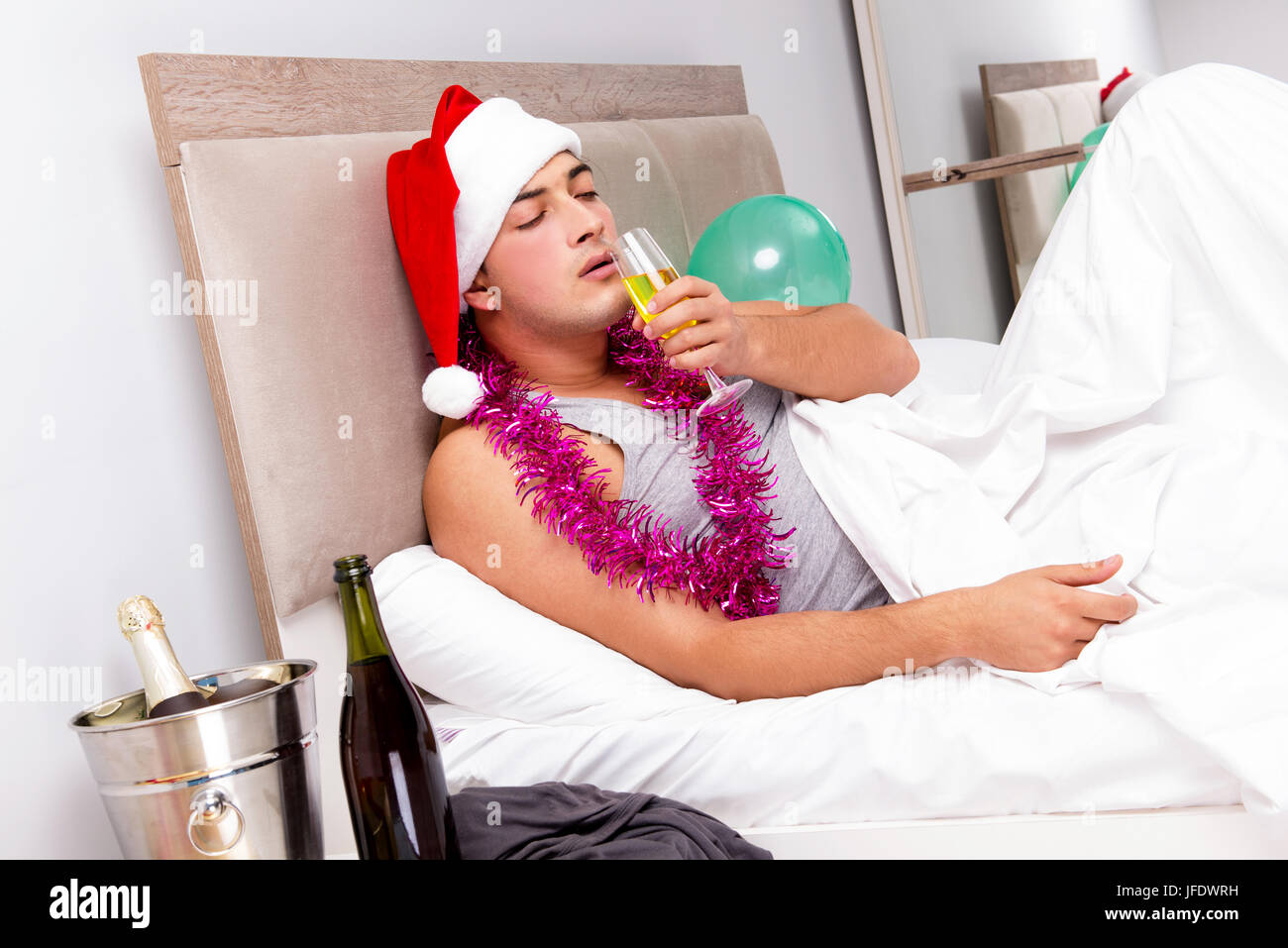Man with hangover after late partying Stock Photo - Alamy