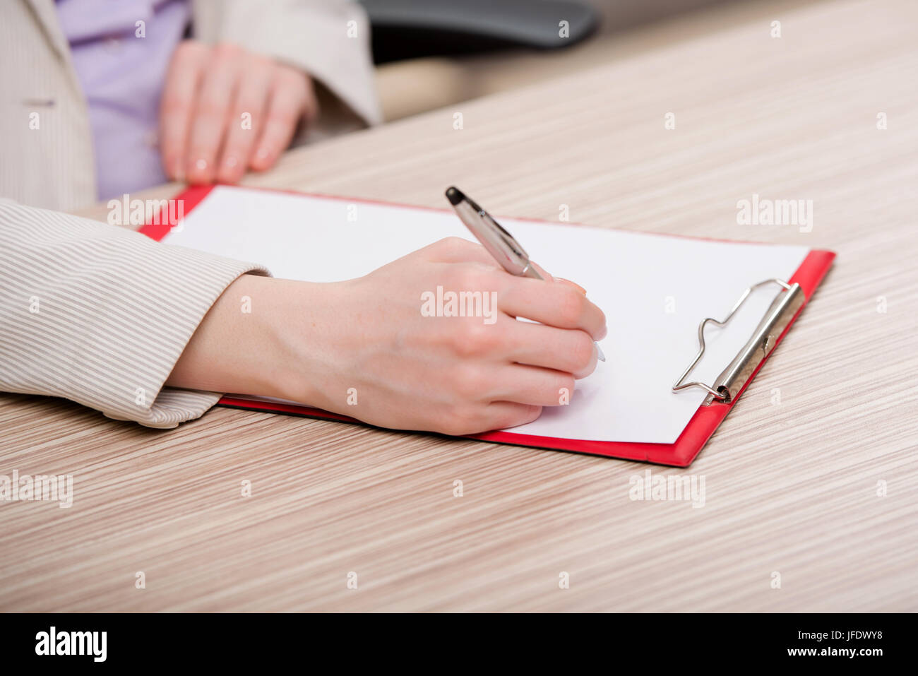 Hands taking notes in the pad Stock Photo - Alamy