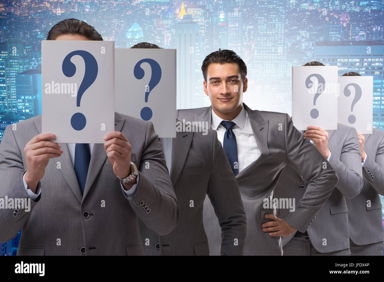 Businessman having answer to many questions Stock Photo - Alamy