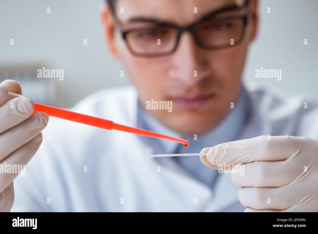 Young doctor doing blood hi-res stock photography and images - Alamy