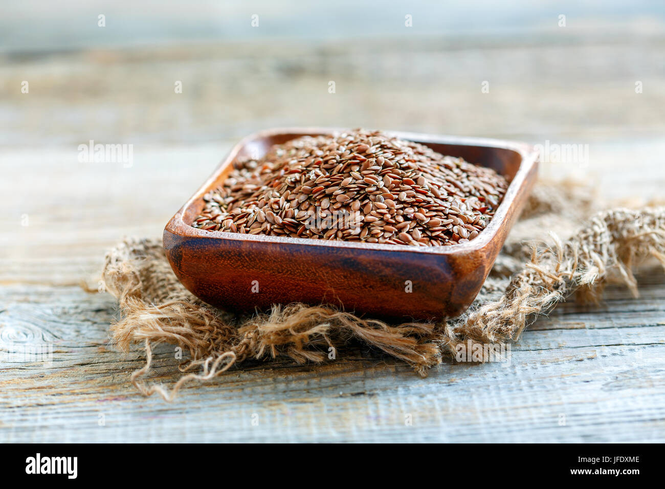 Flax seeds in bowl hi-res stock photography and images - Alamy