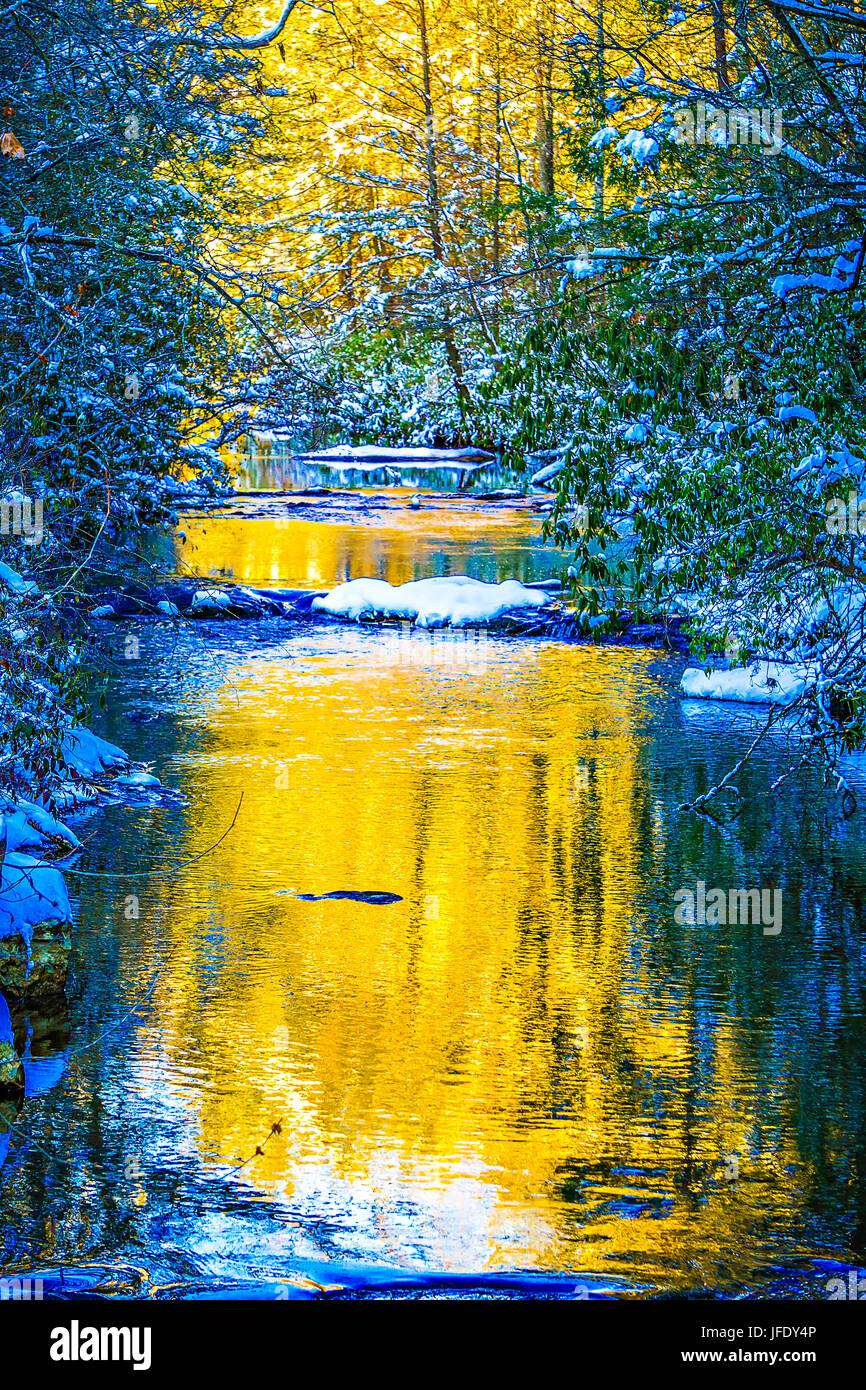 mountain stream at sunset with snow Stock Photo - Alamy