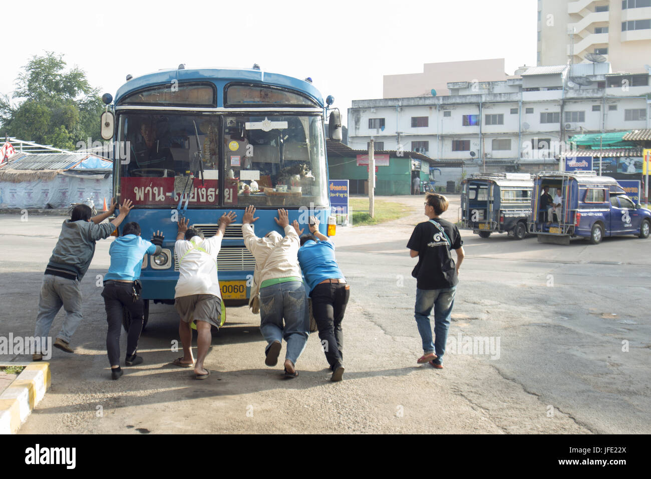 Pushing bus hi-res stock photography and images - Alamy