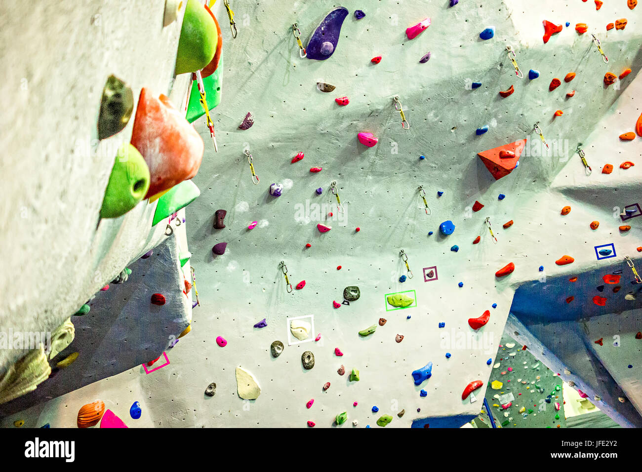 Rock climbing wall recreation center Stock Photo - Alamy