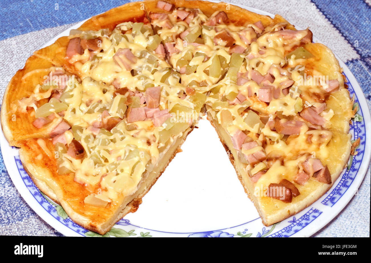 Pizza on a plate Stock Photo - Alamy