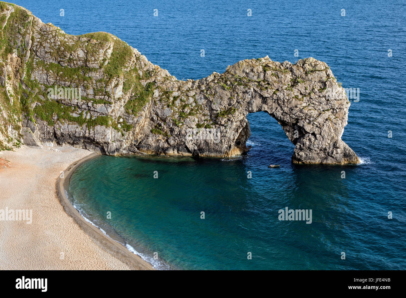Durdle Door - a natural limestone arch on the Jurassic Coast near ...