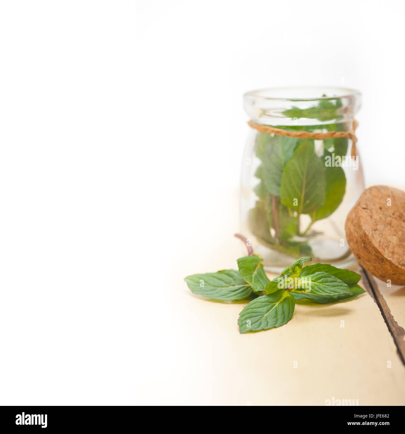 fresh mint leaves on a glass jar Stock Photo - Alamy