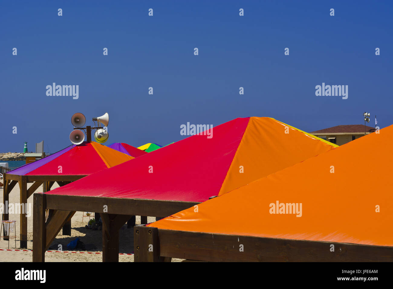 Sunshade and Speakers on the Beach Stock Photo - Alamy