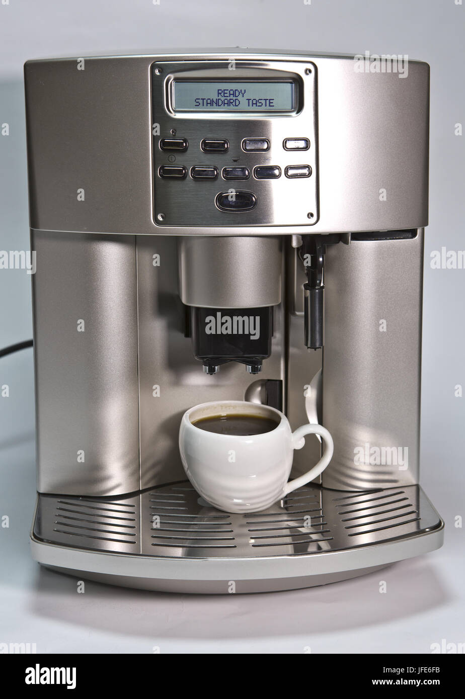 Modern Coffee Machine and a cup Stock Photo - Alamy